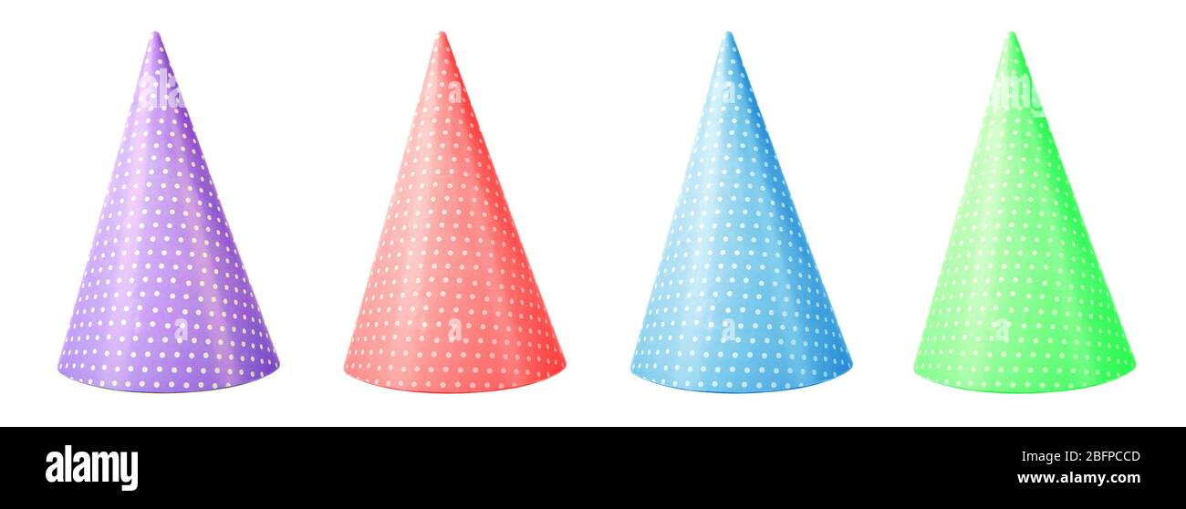 Colorful party caps on white background Stock Photo - Alamy