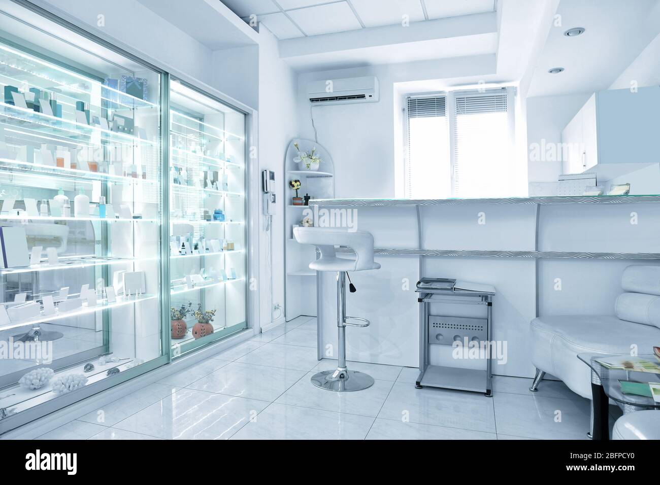 Reception in modern beauty salon Stock Photo - Alamy