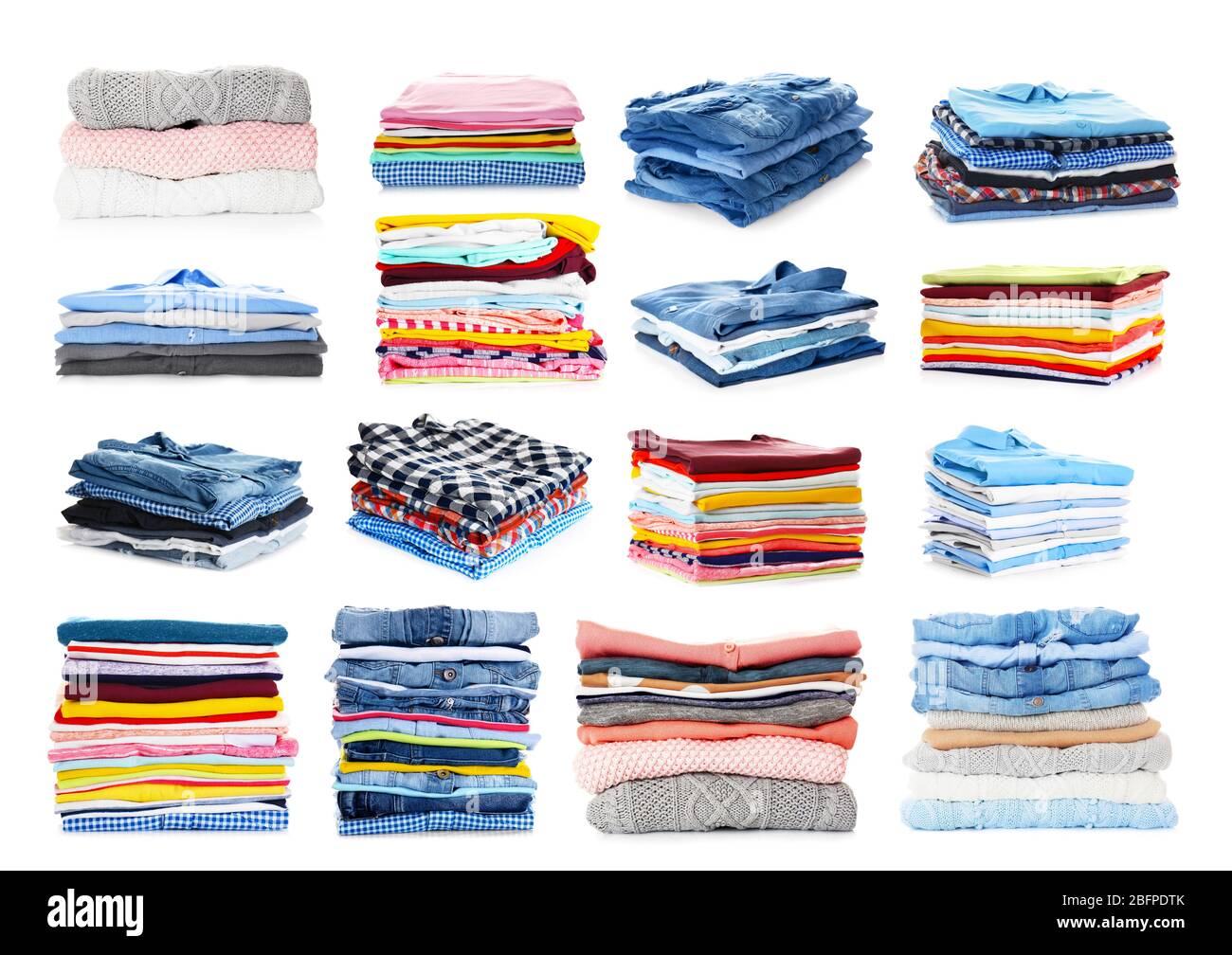 Stacks of folded clothes on white background Stock Photo - Alamy