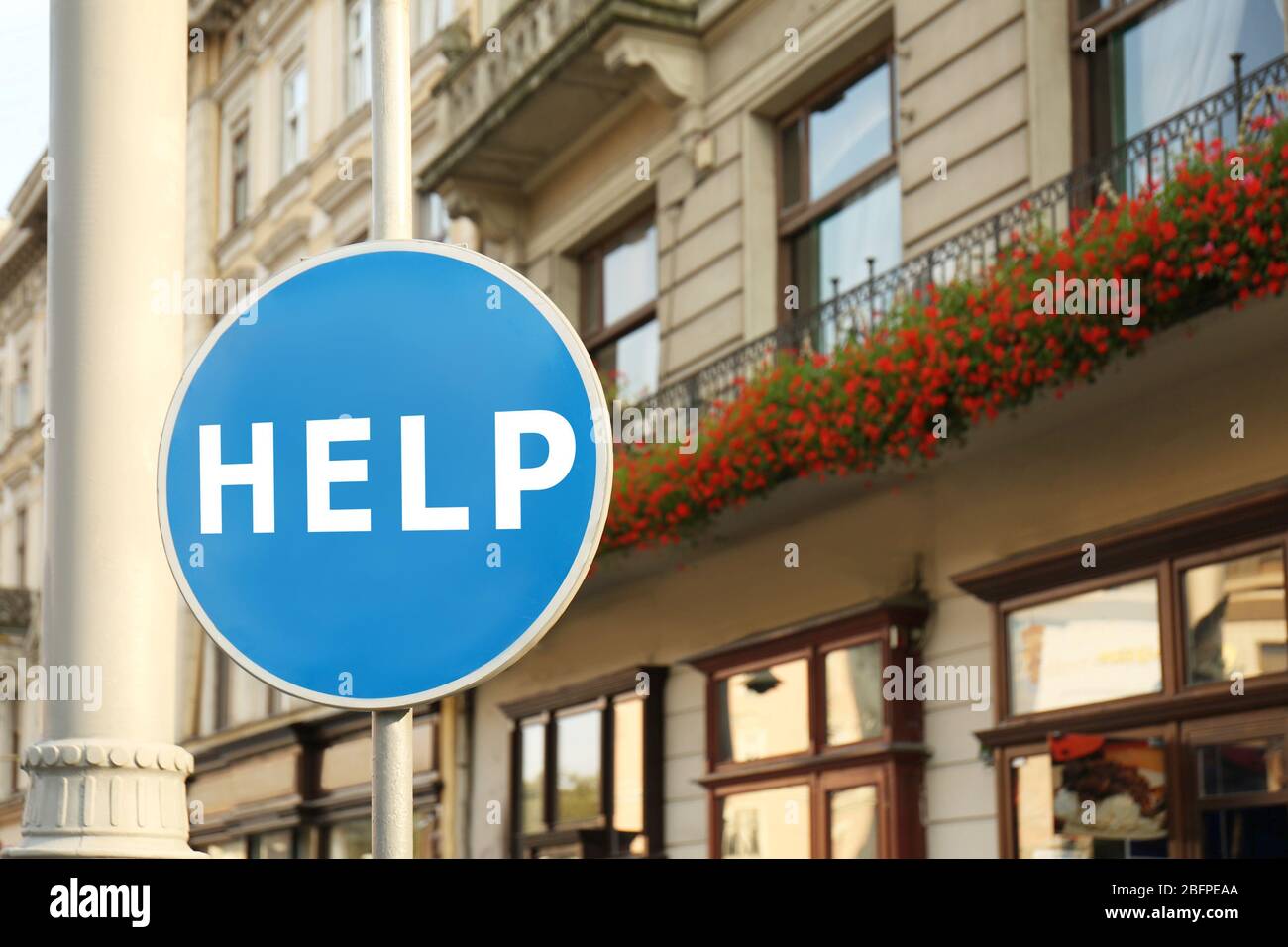Text HELP on road sign. Support service concept Stock Photo - Alamy