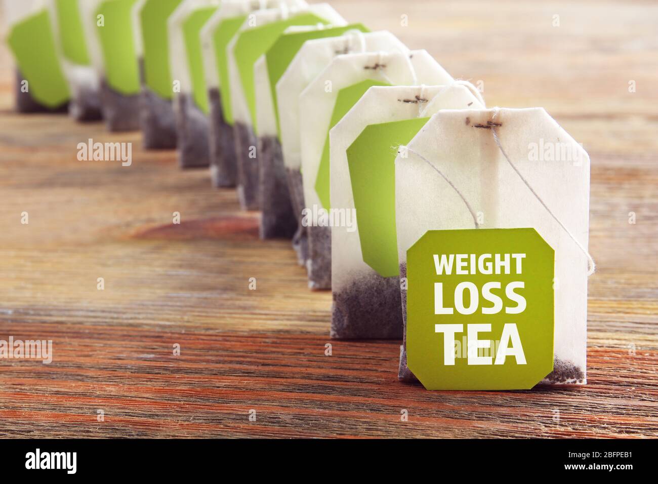 Row of tea bags hi-res stock photography and images - Alamy
