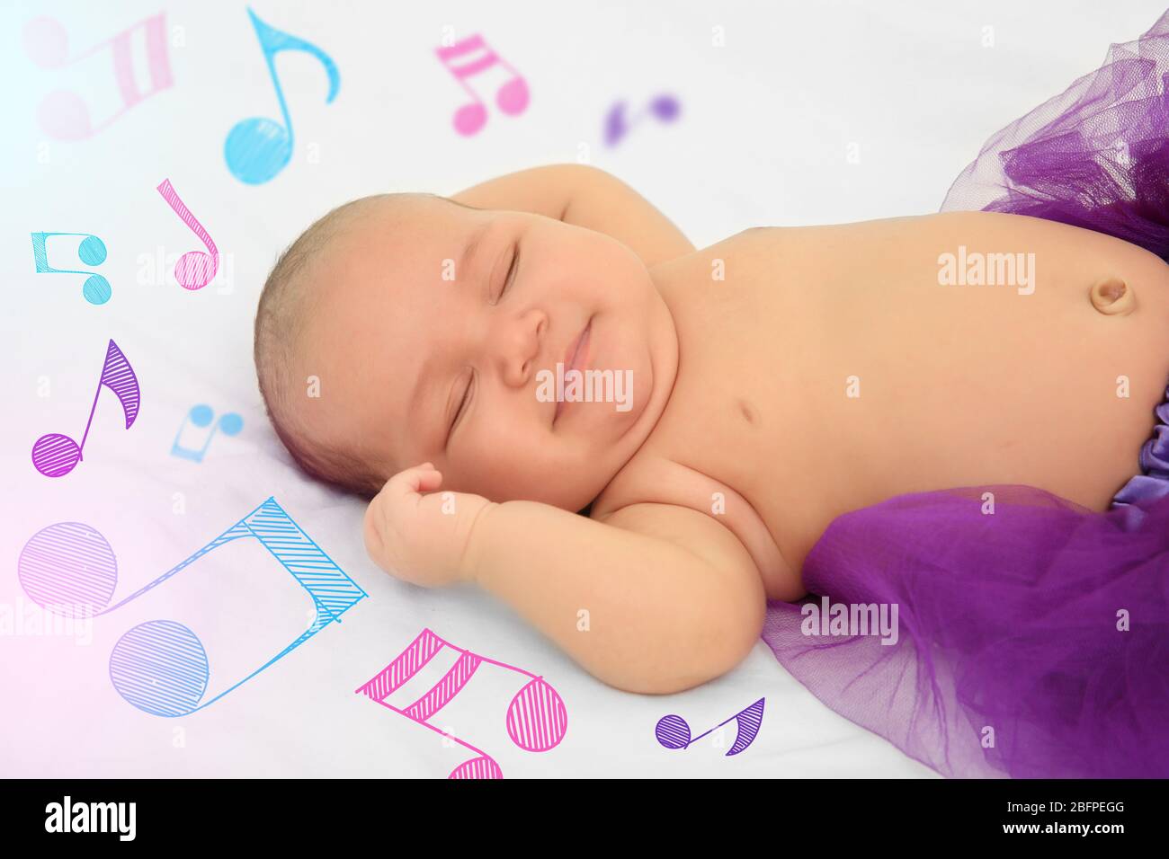 Cute baby sleeping on bed. Lullaby songs and music concept Stock Photo ...