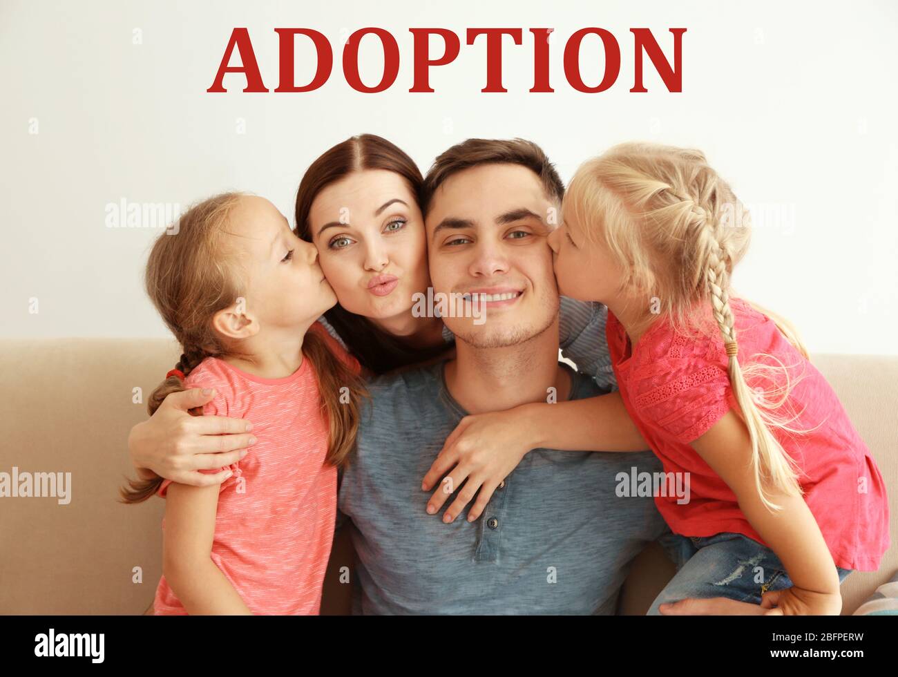 Adoption concept. Happy family at home Stock Photo - Alamy