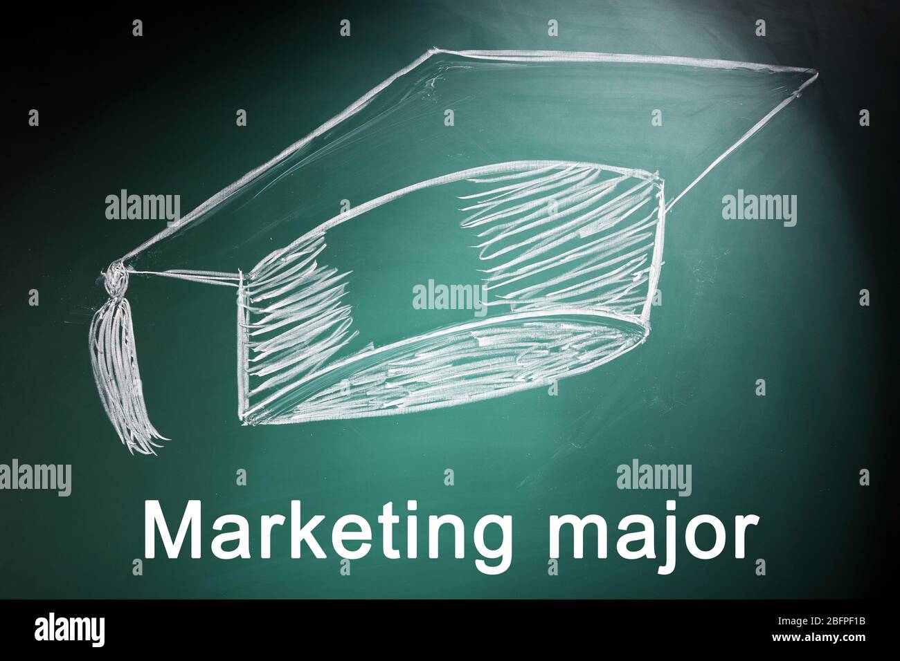 Marketing major concept. Drawing of graduation cap on blackboard Stock ...