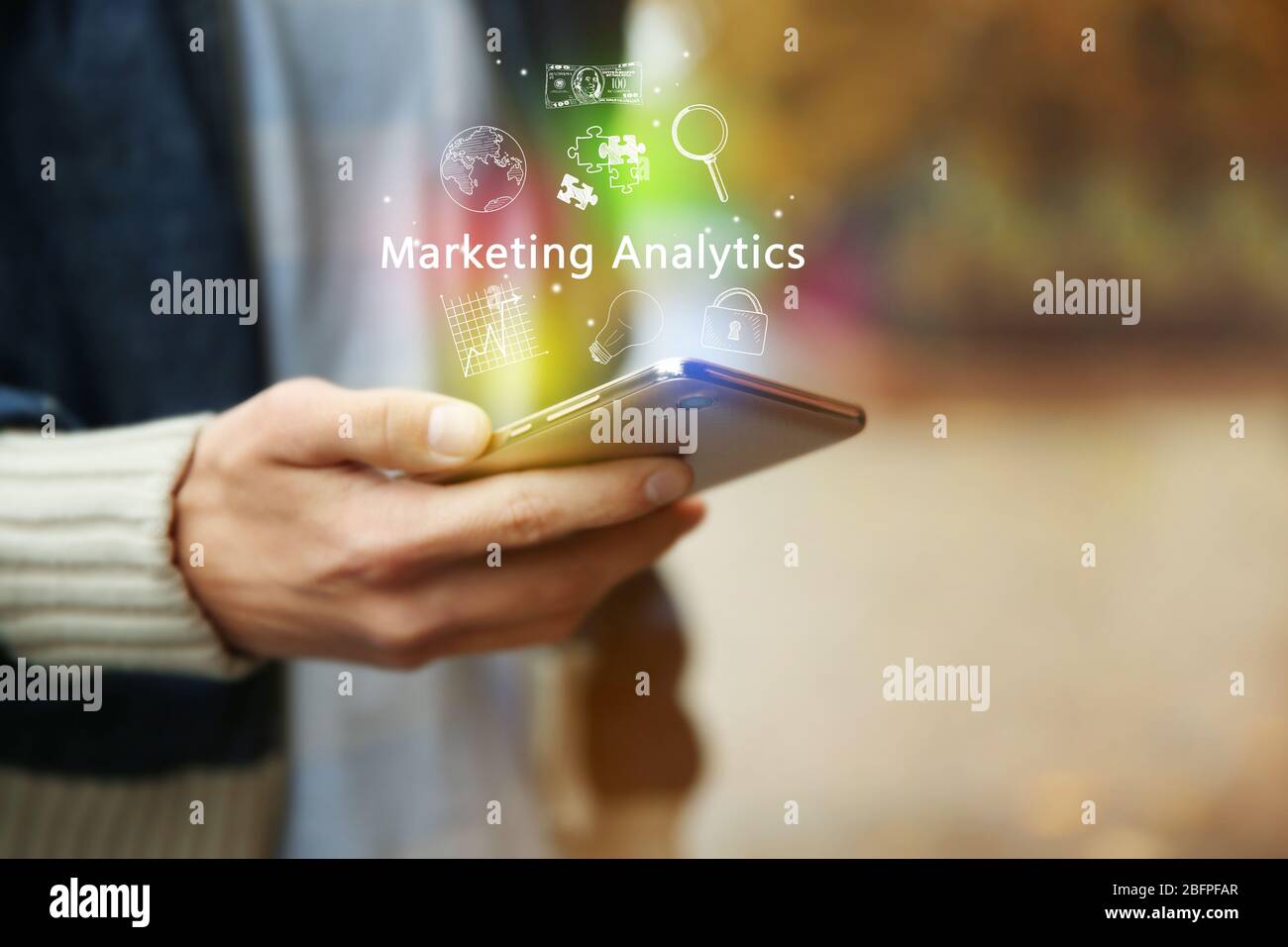 Marketing analytics concept. Man using smartphone outdoors Stock Photo ...