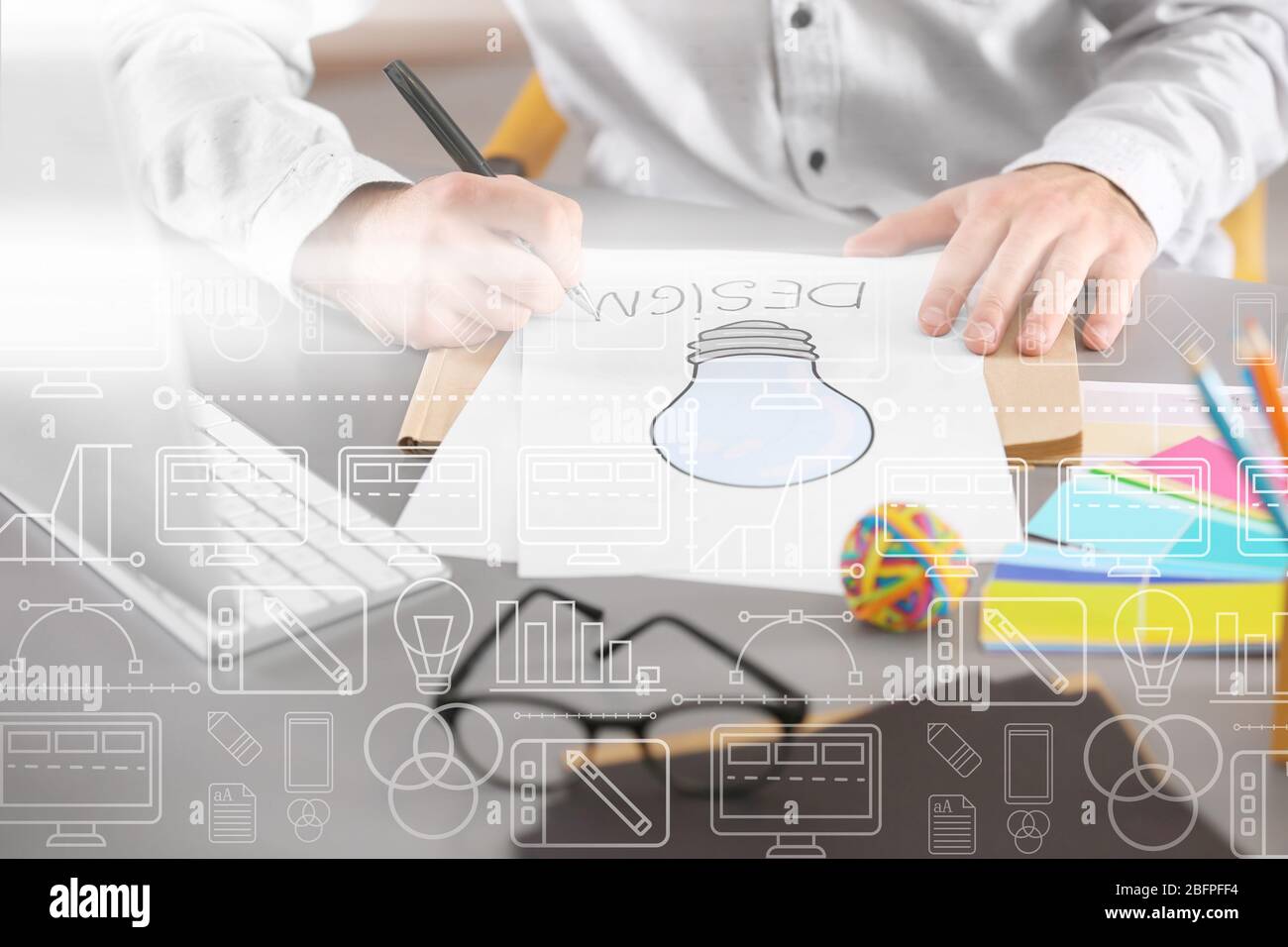 Designer concept. Man drawing sketch on paper, closeup Stock Photo - Alamy