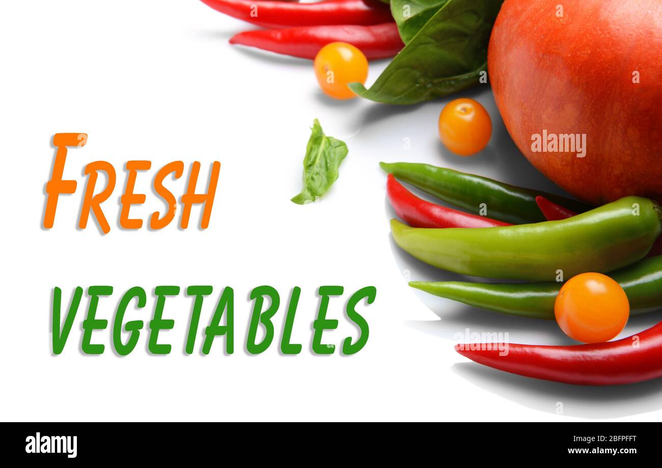 Fresh vegetables and text on white background Stock Photo - Alamy