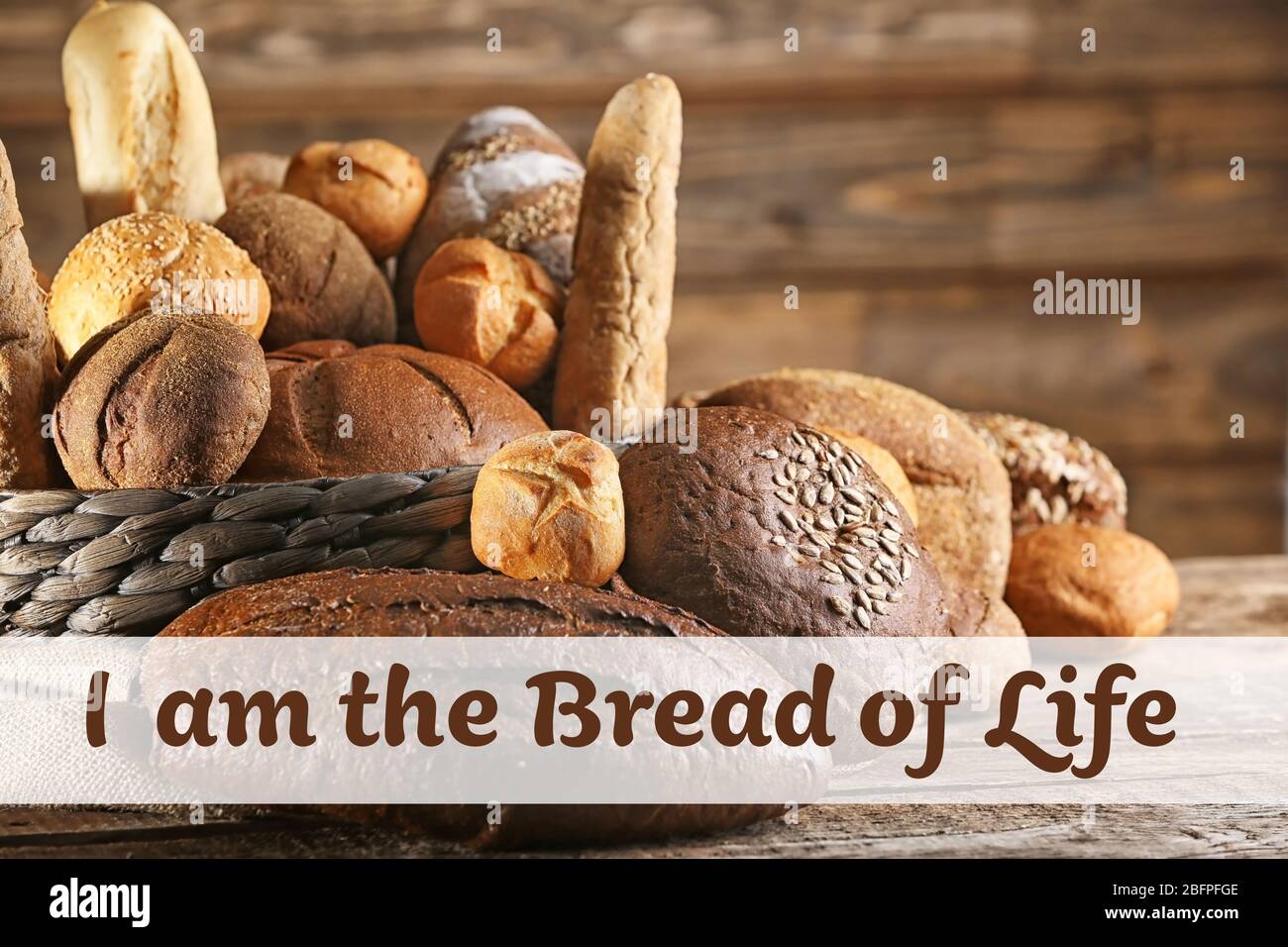 Assortment of bread and text on wooden background Stock Photo - Alamy