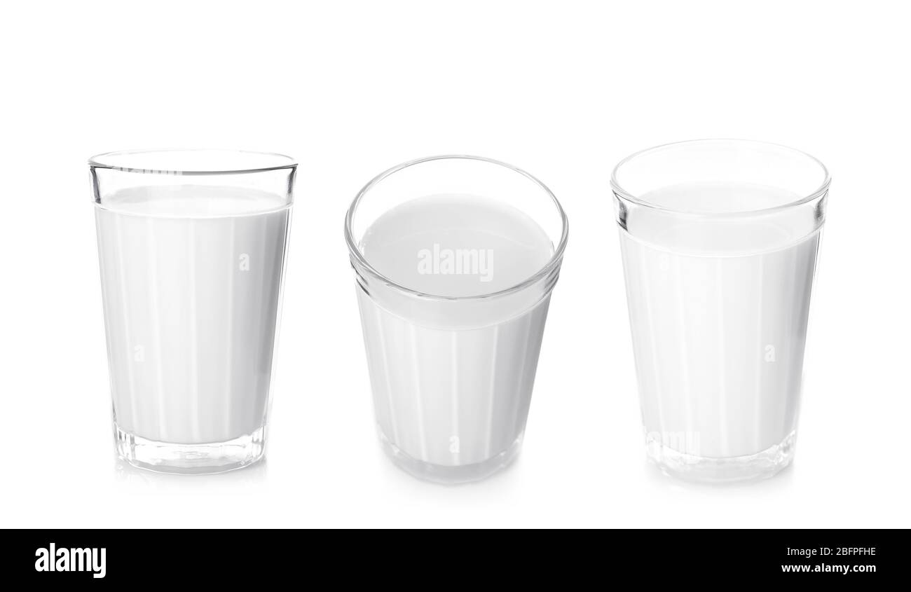 Glasses of fresh milk on white background Stock Photo - Alamy