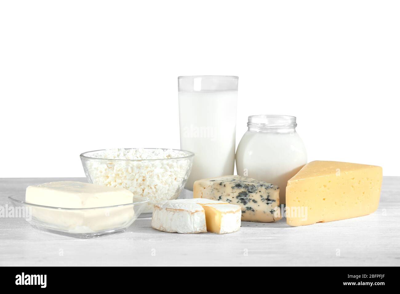 Assortment of fresh dairy products on white background Stock Photo - Alamy