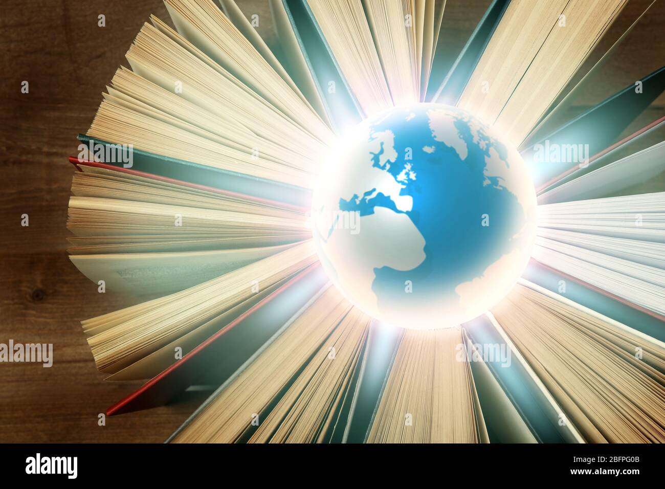 Globe and books on wooden background. World literature concept Stock ...