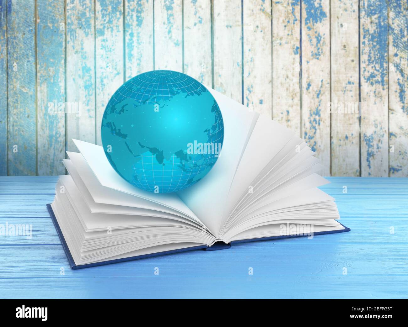 Globe and book on wooden background. World literature concept Stock ...