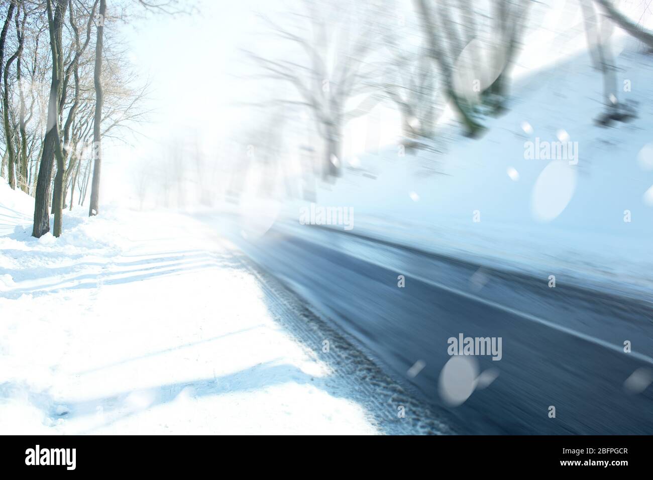 Countryside road during snow storm Stock Photo - Alamy