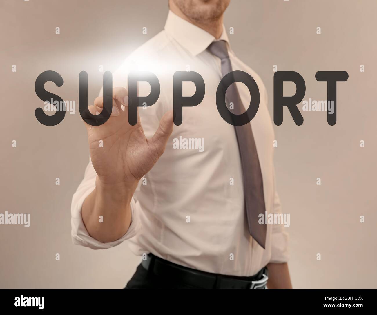 Support concept. Man pointing on text against color background Stock ...