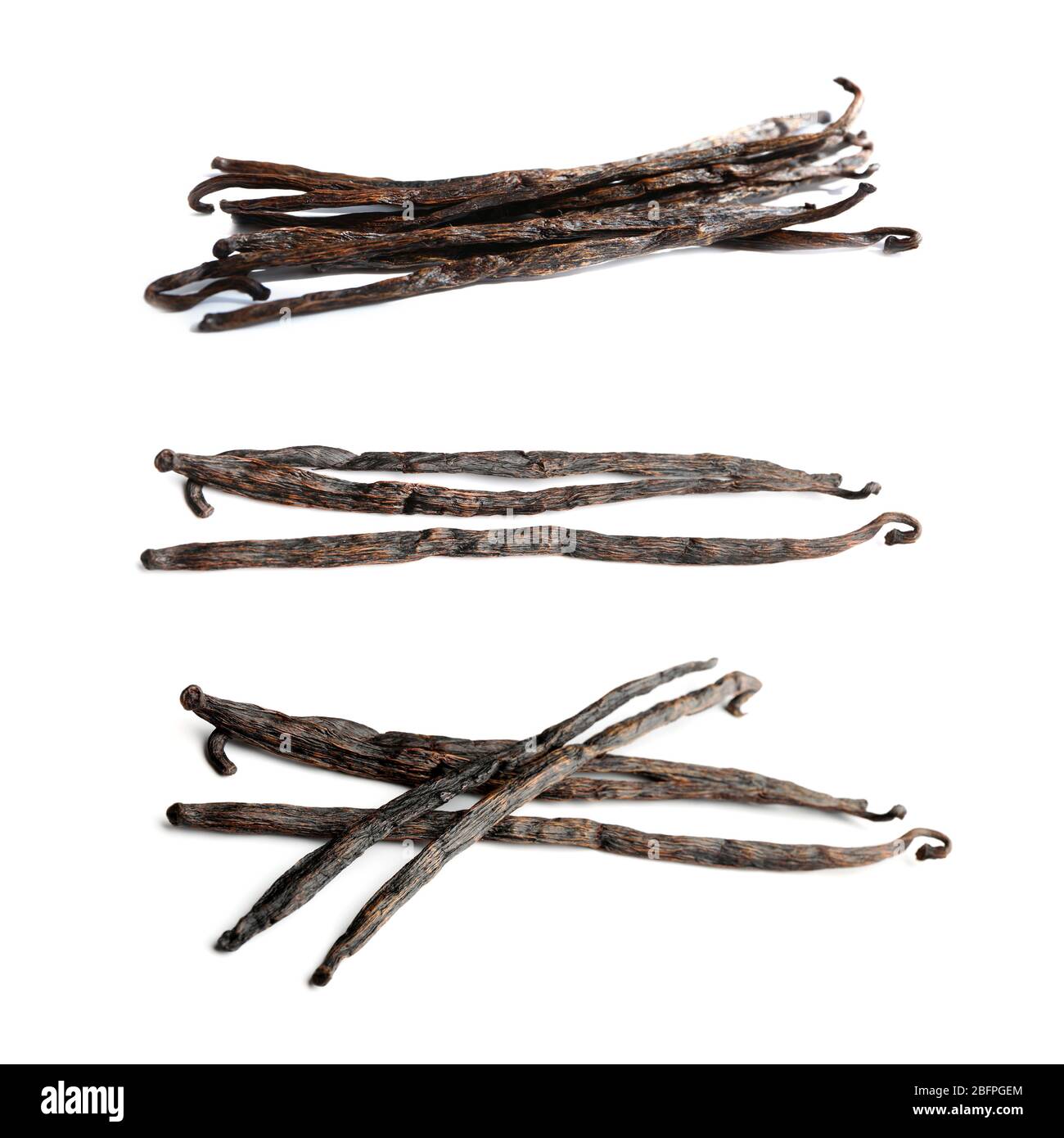 Vanilla pods on white background Stock Photo - Alamy