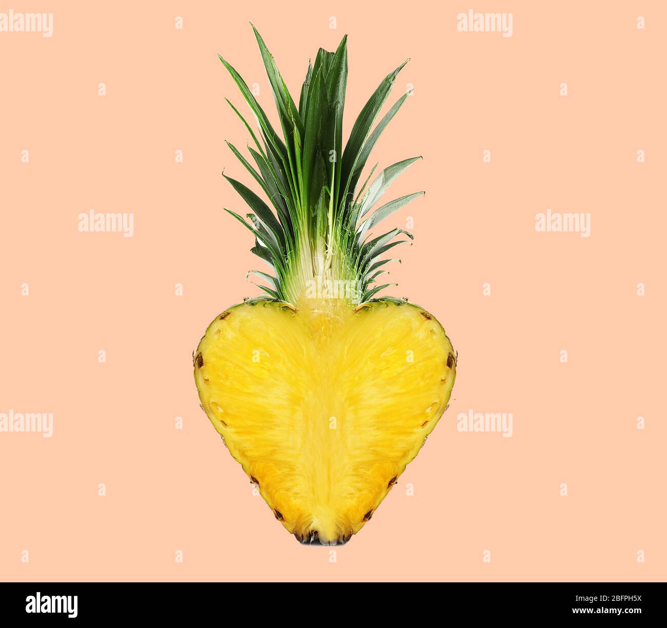 Heart shaped pineapple on color background. Superfood concept Stock ...