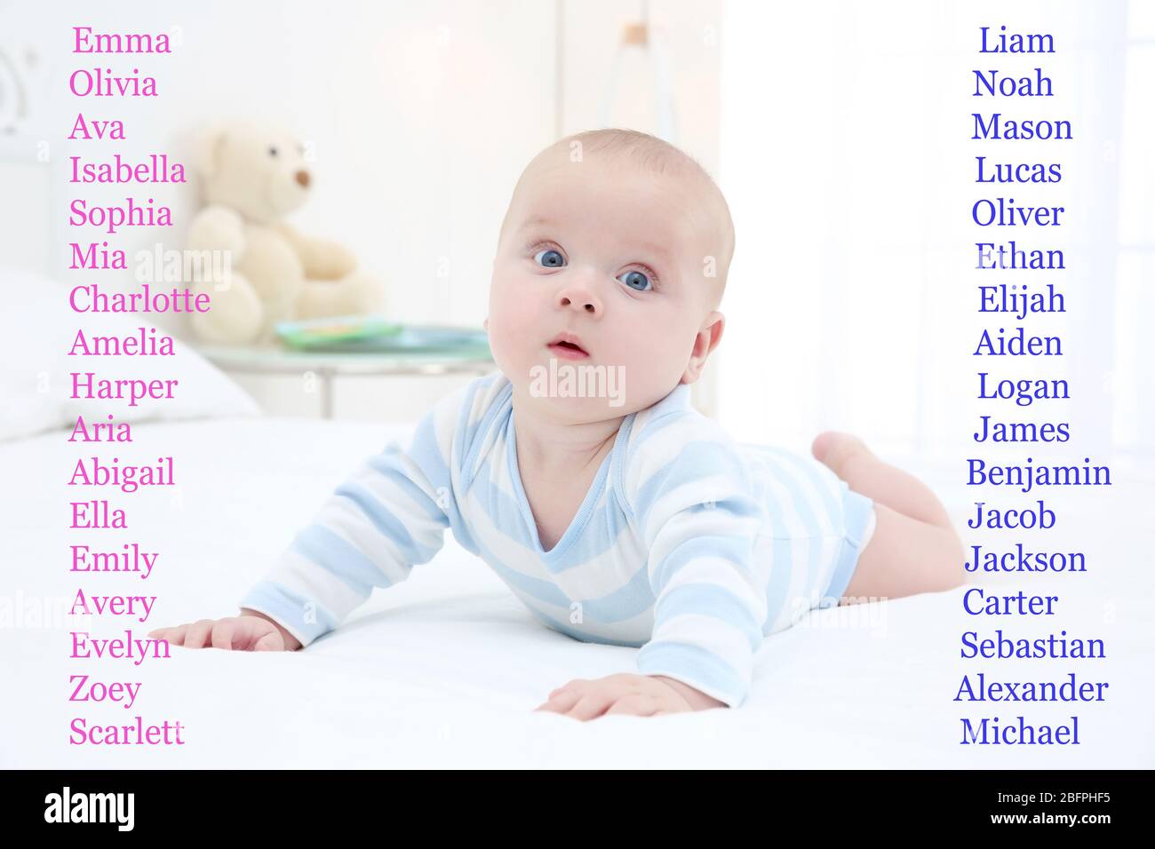 Baby names concept. Cute little child lying on bed at home Stock Photo ...