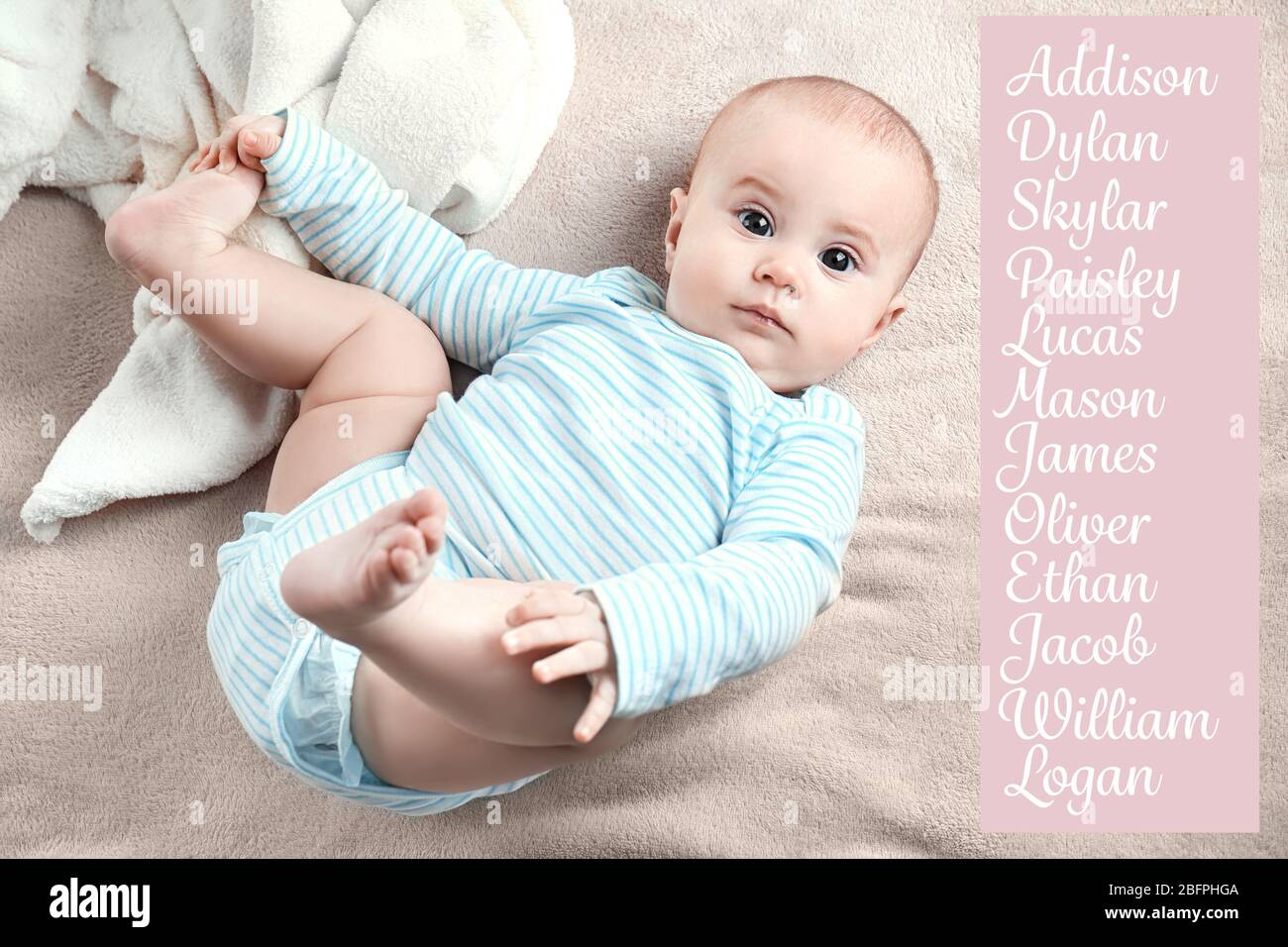 Baby names concept. Cute little boy lying on plaid Stock Photo - Alamy
