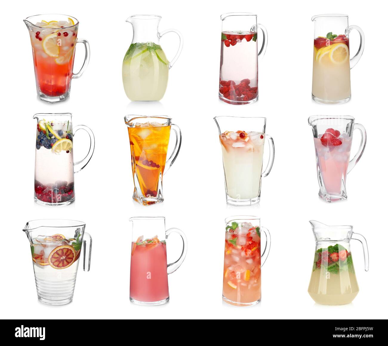 Different drinks in glass jugs on white background. Ideas for summer ...