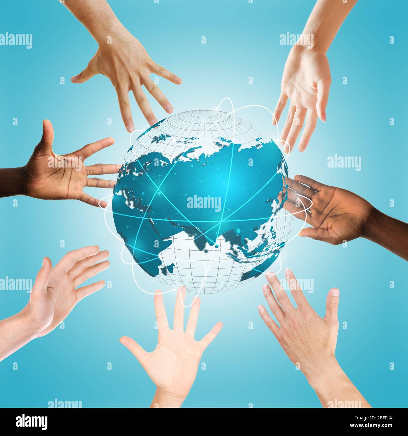 Hands surrounding globe on blue background. Concept of worldwide unity ...