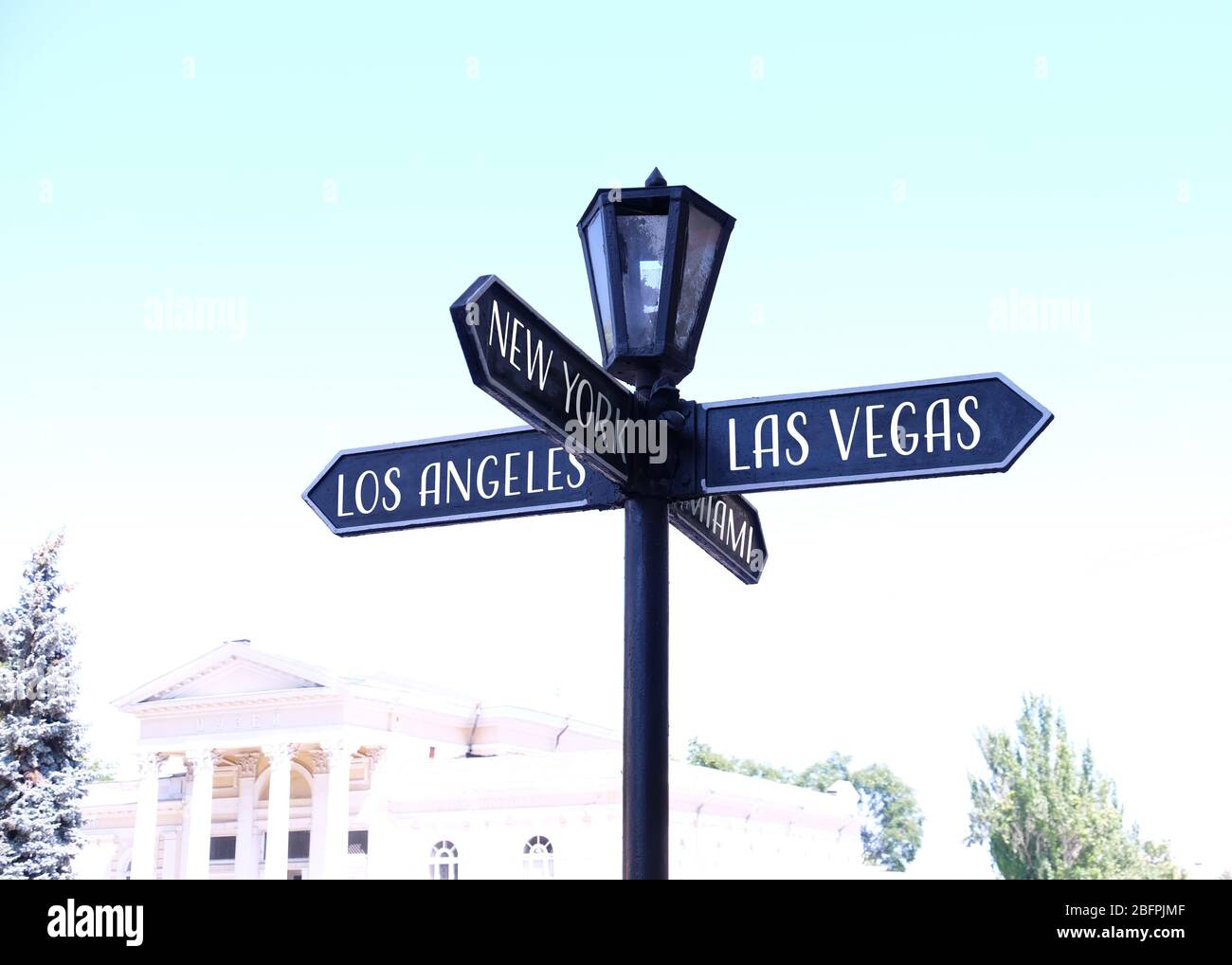 Signpost with different directions on street. Travel USA concept Stock ...