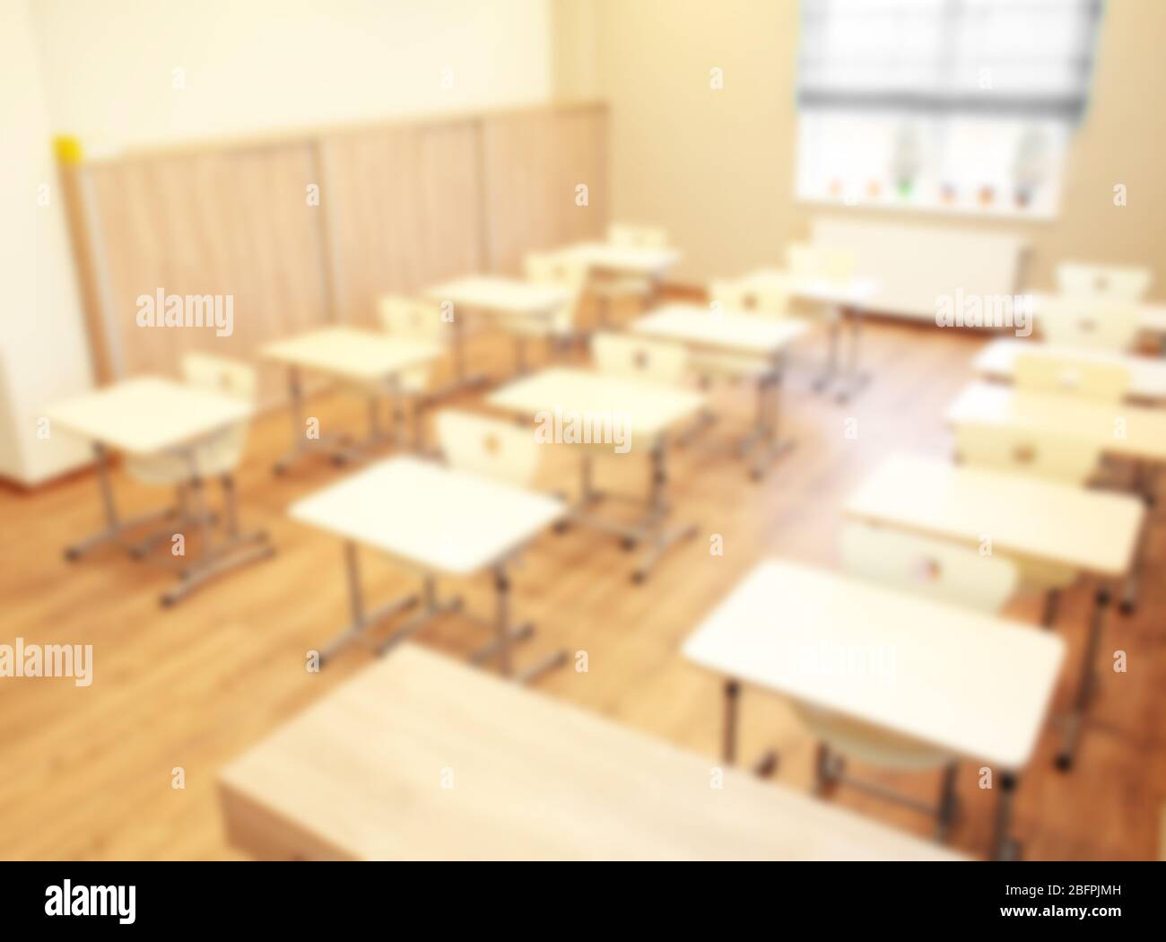 Blurred view of empty classroom Stock Photo - Alamy