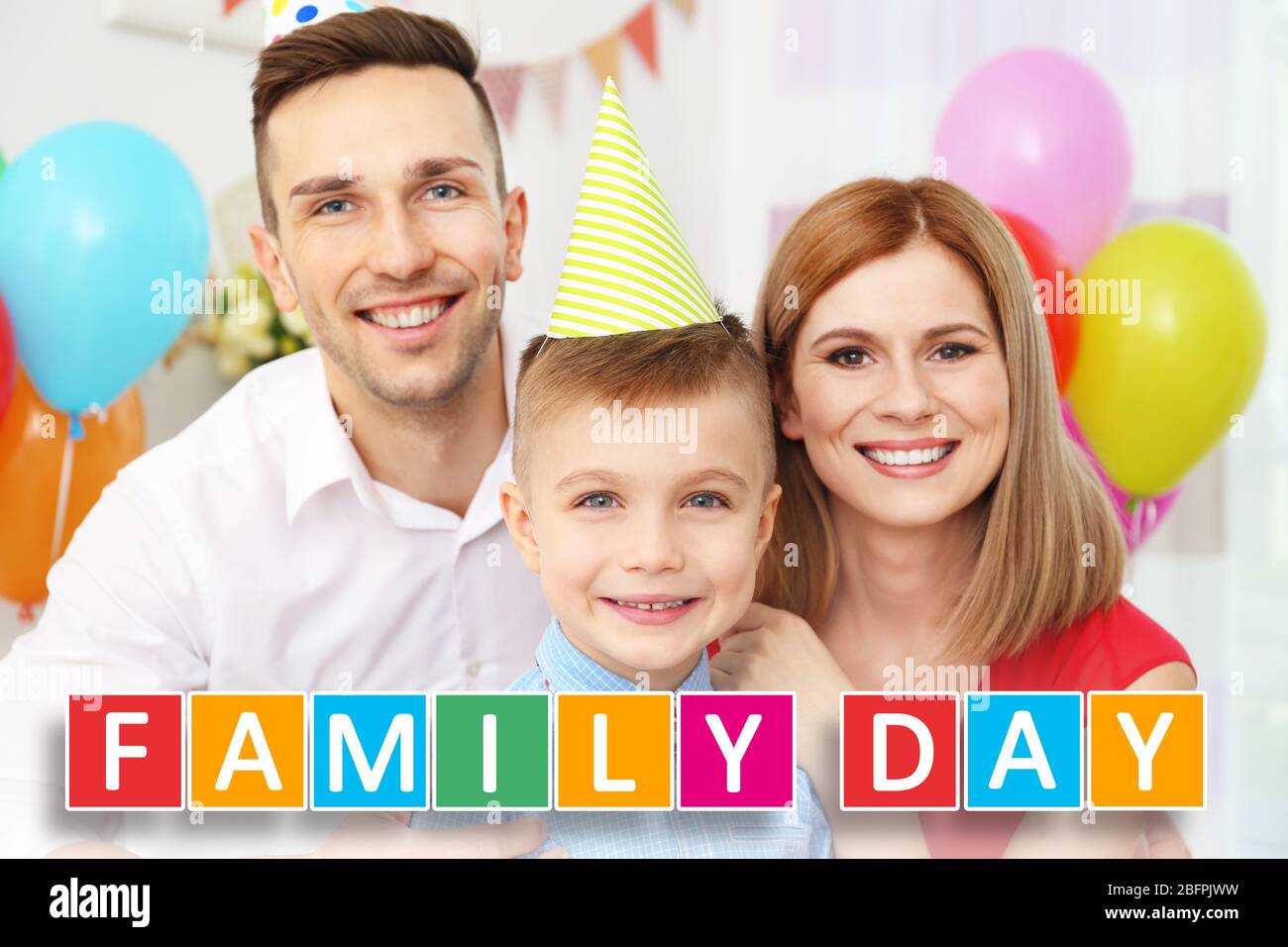 Parents and little kid celebrating family day. Holiday concept Stock ...