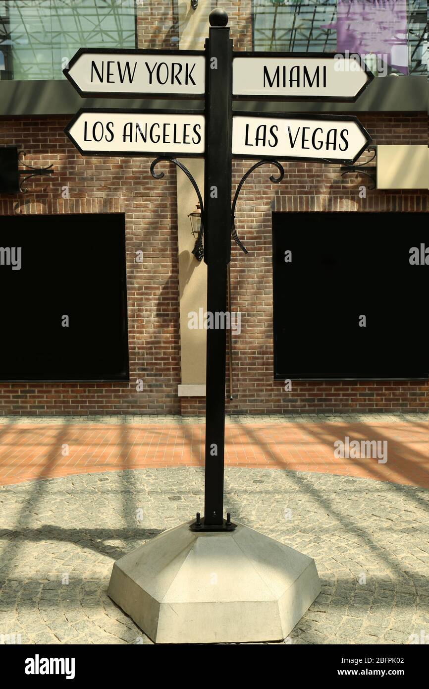 Signpost with different directions on street. Travel USA concept Stock ...