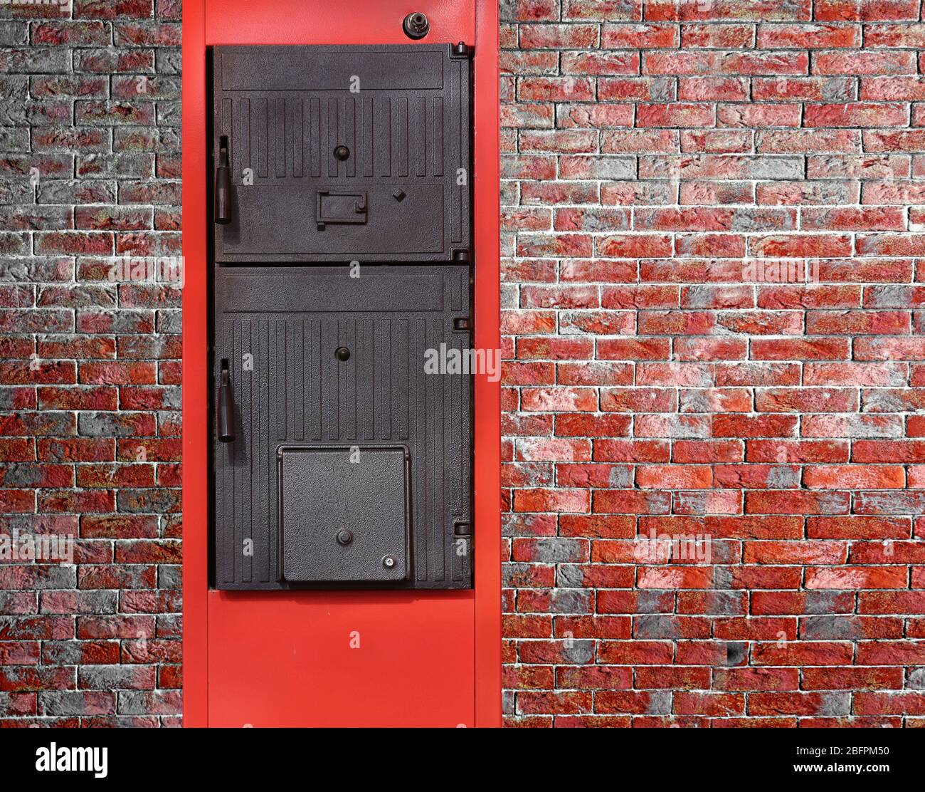 Energy savings concept. Solid fuel boiler on brick wall background ...
