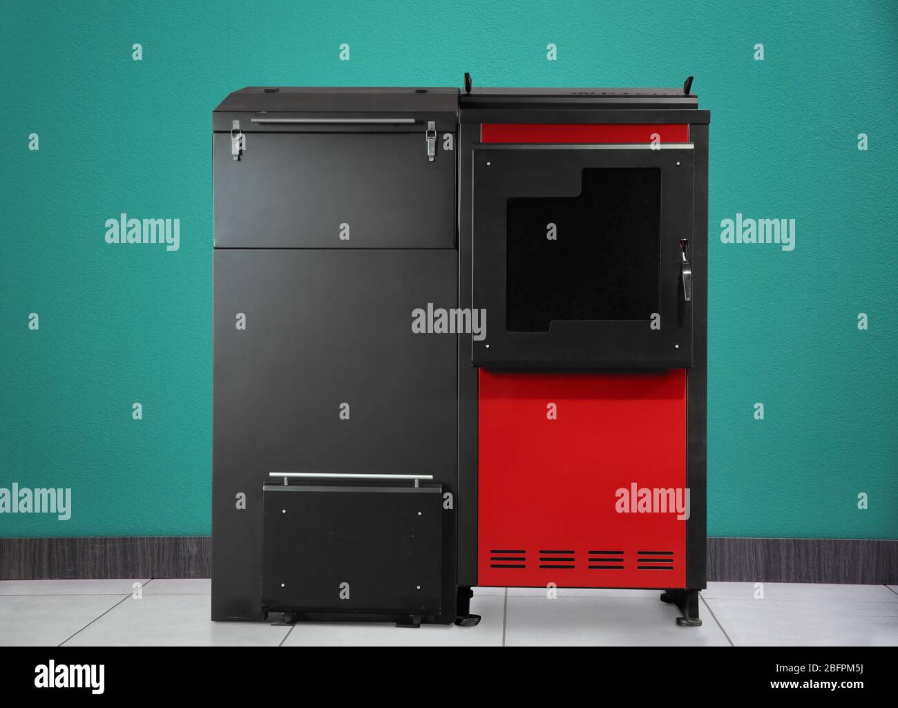 Energy savings concept. Solid fuel boiler on color wall background ...