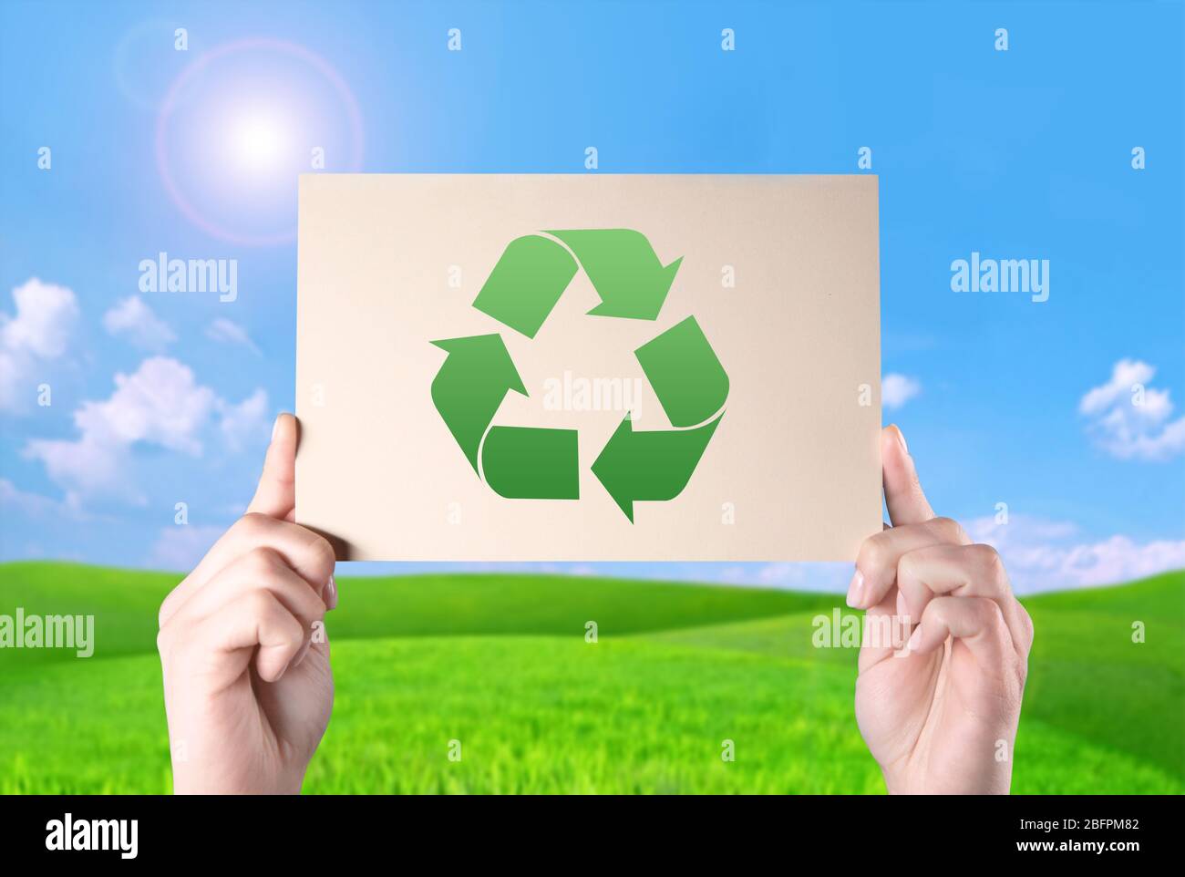 Concept of environmental conservation and protection. Man holding paper ...