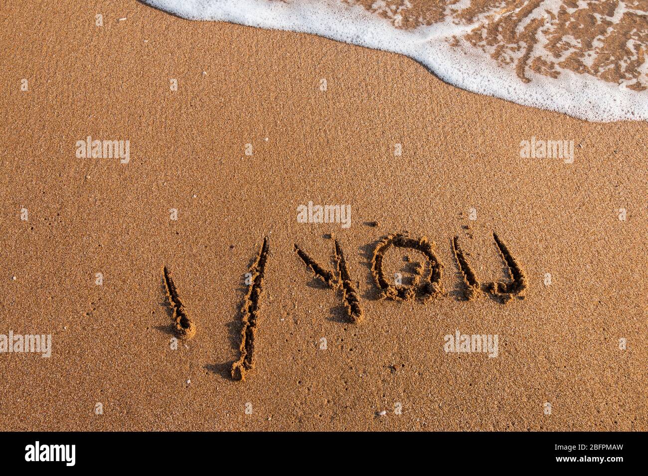 Romantic love lettering and heart sign on the beach beach Stock Photo ...