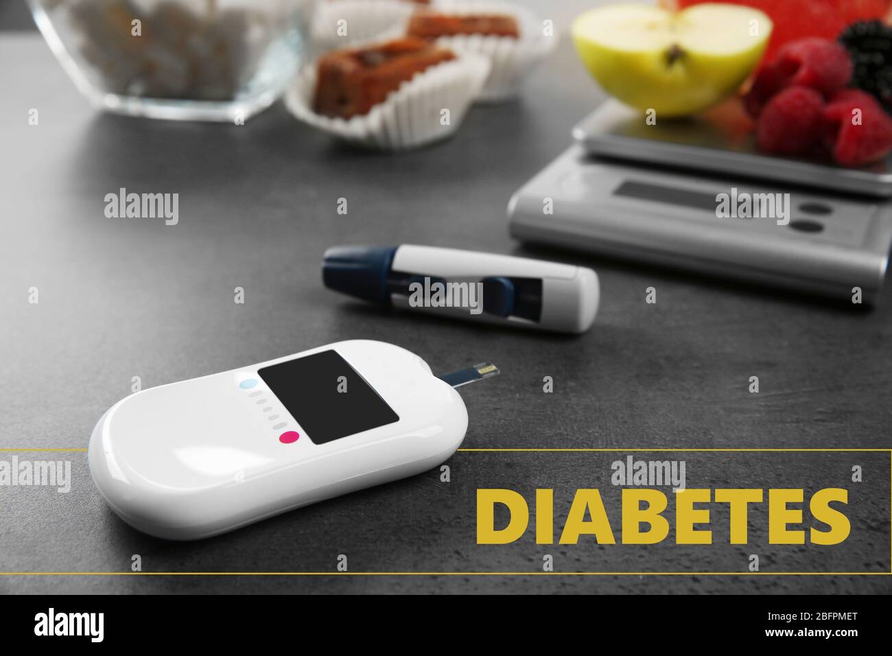 Diabetes concept. Glucose meter on table Stock Photo - Alamy