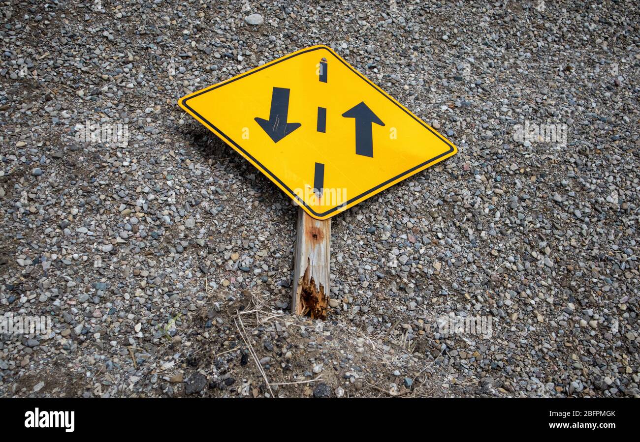 Broken traffic sign lying on the gravel, Road way construction Stock ...