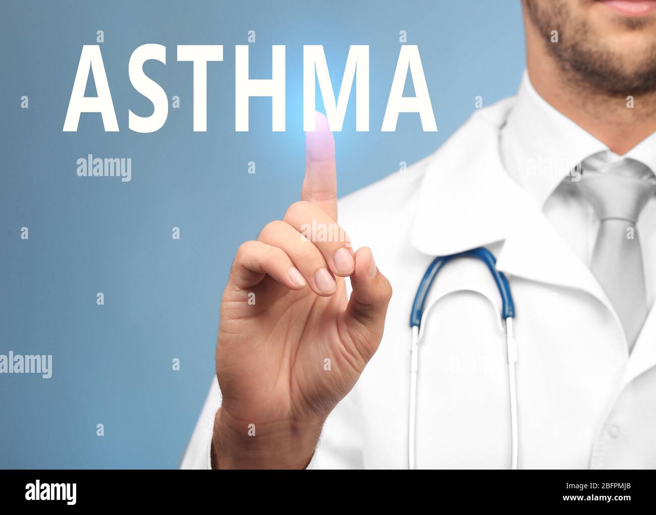 Health care concept. Doctor pointing on word ASTHMA, color background ...