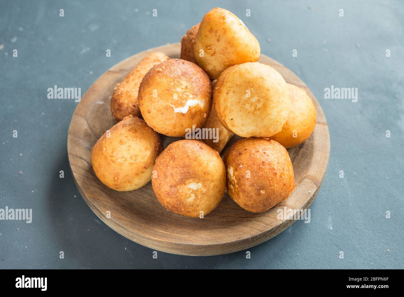 Traditional Colombian buñuelo - Deep Fried Cheese Bread Stock Photo - Alamy