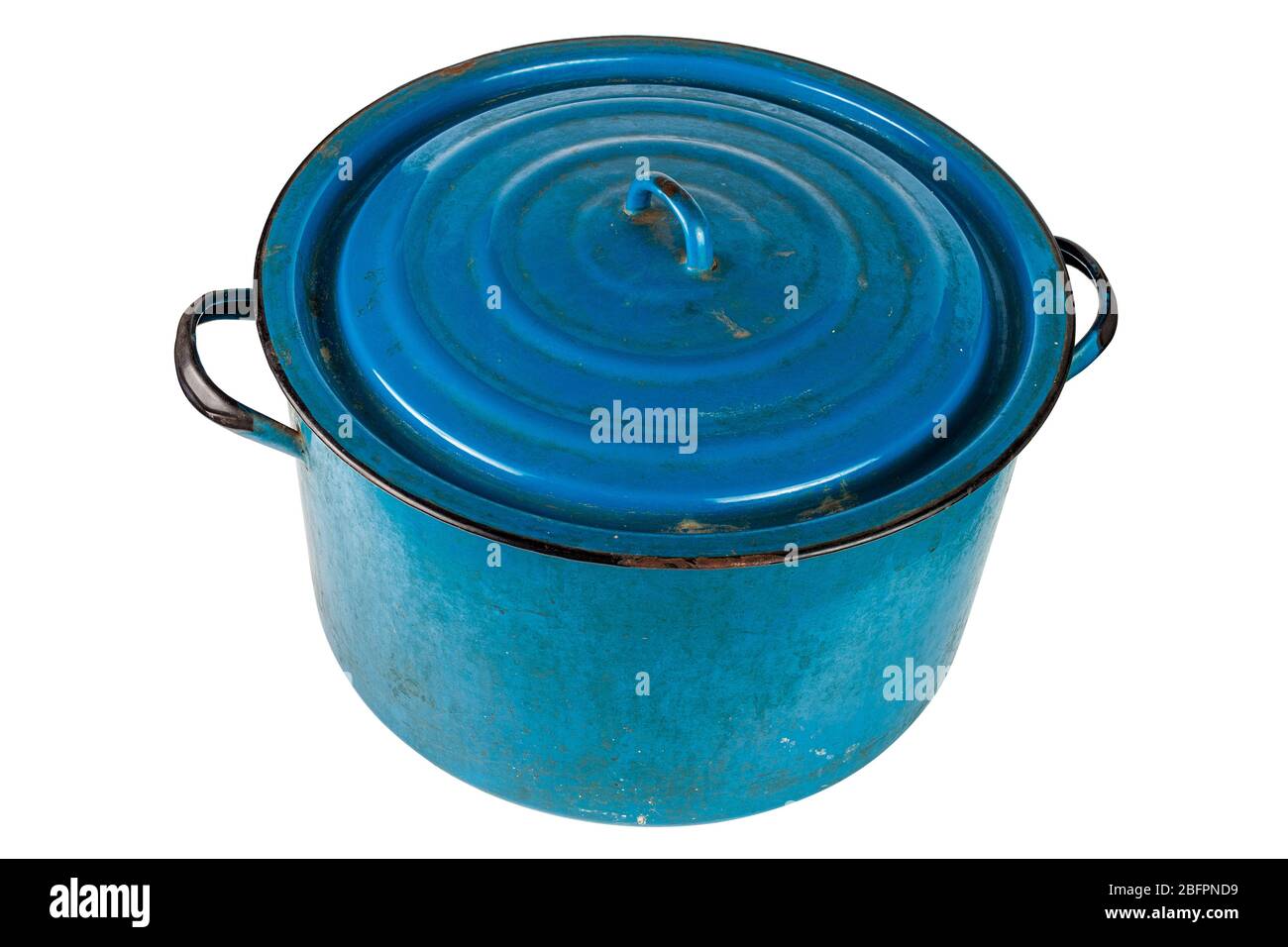 old large enameled blue pot with cover isolated on white background ...