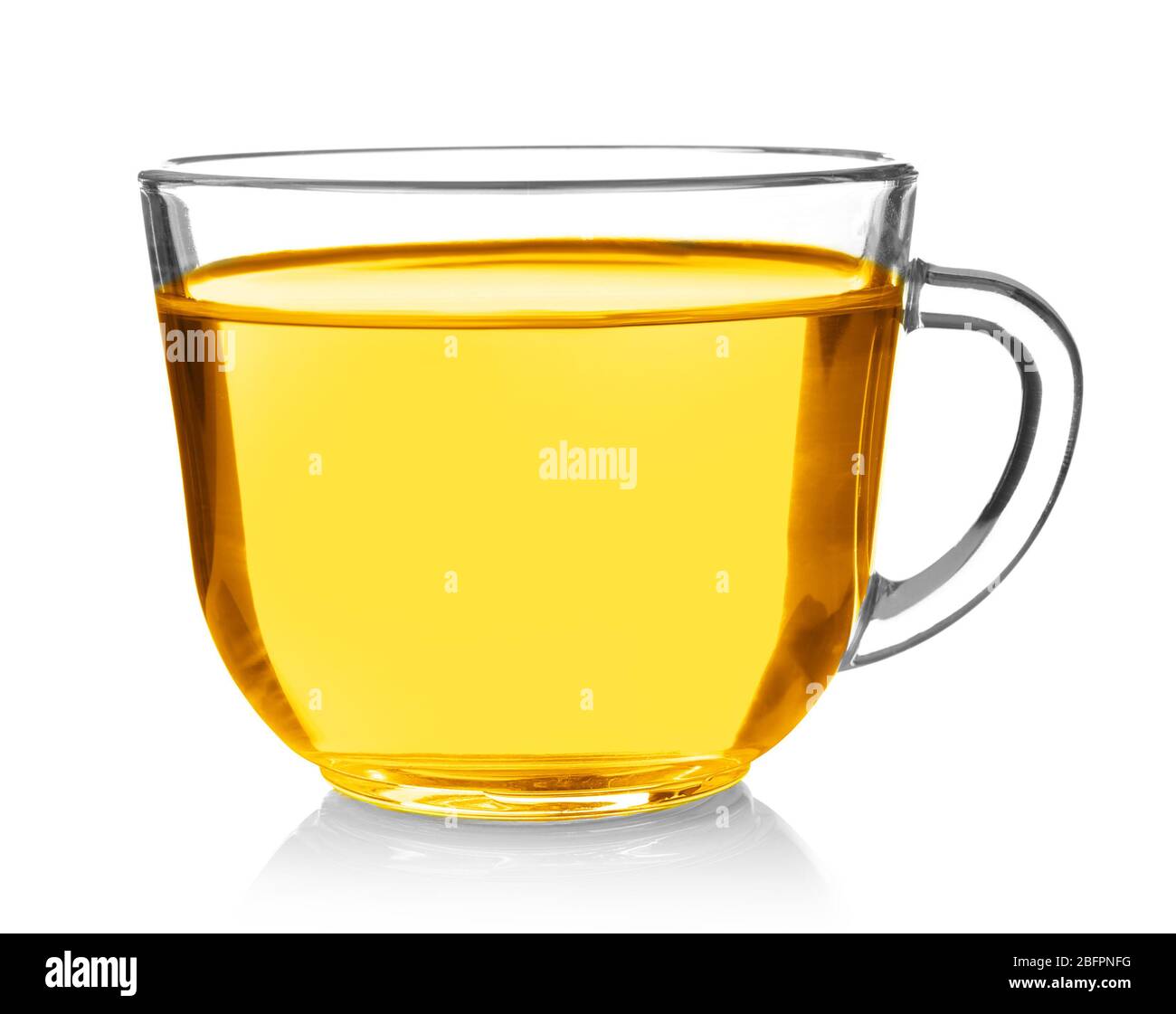Glass cup of cooking oil on white background Stock Photo - Alamy