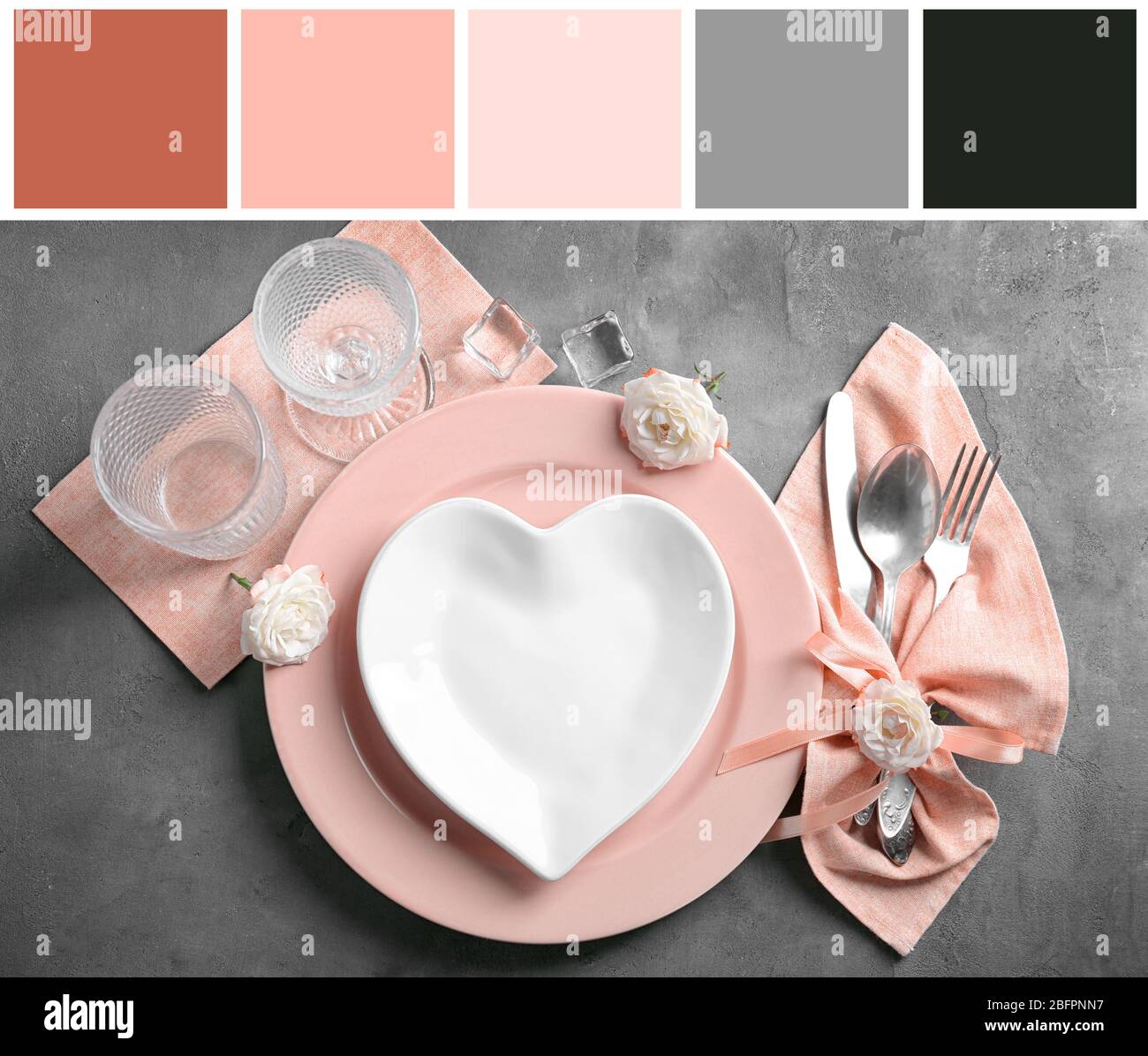 Palette with salmon color and beautiful table setting with flowers ...
