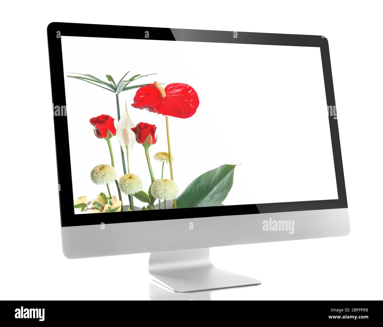Modern computer display with beautiful flowers on screen, white ...