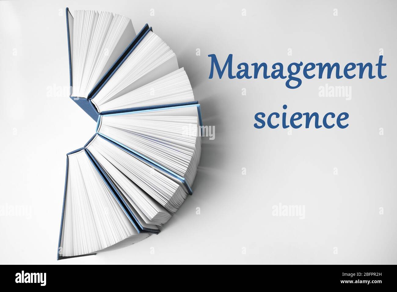 Text MANAGEMENT SCIENCE and books on white background Stock Photo - Alamy