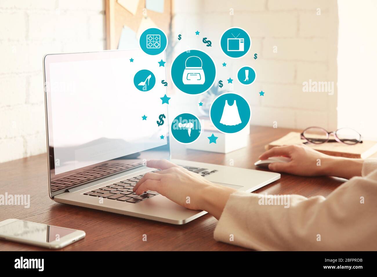 Woman using laptop for browsing internet store at table, closeup ...