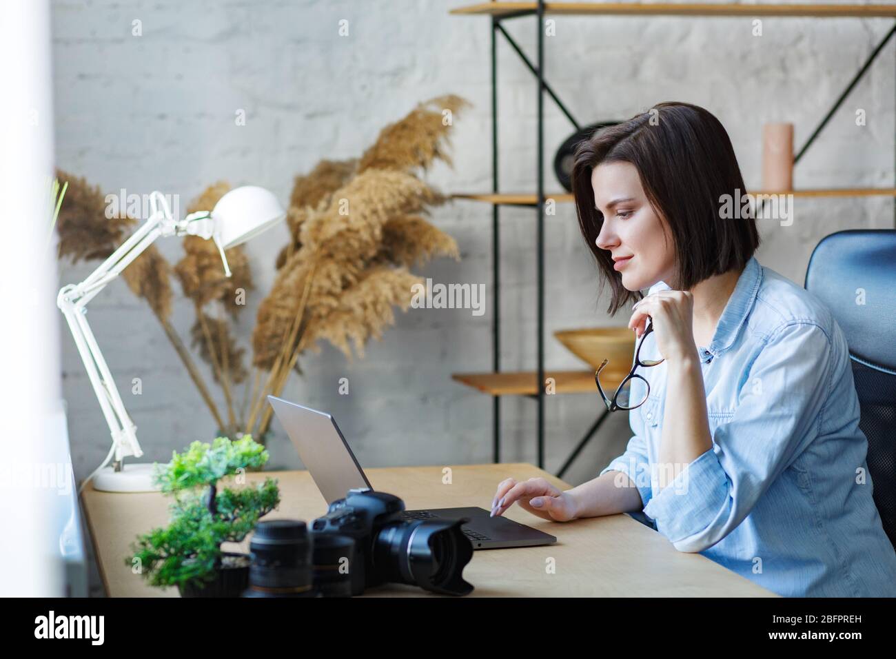 Working from home. Communication online. Portrait of smiling female ...