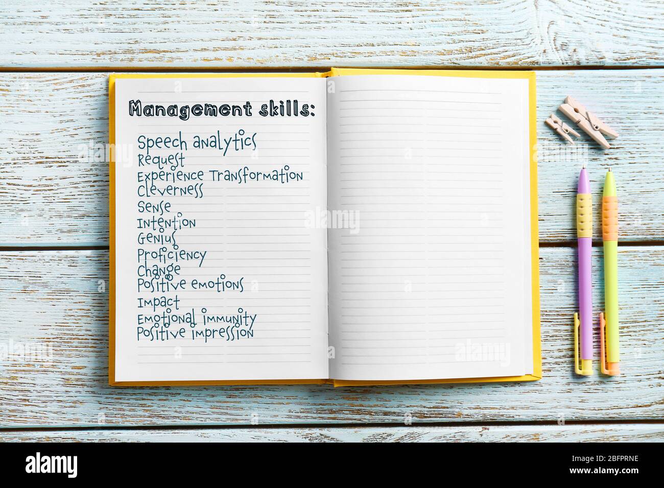 List of MANAGEMENT SKILLS written in notebook on wooden background ...