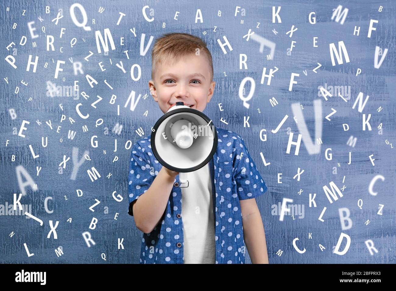 Little boy with megaphone and letters on blue background. Speech ...
