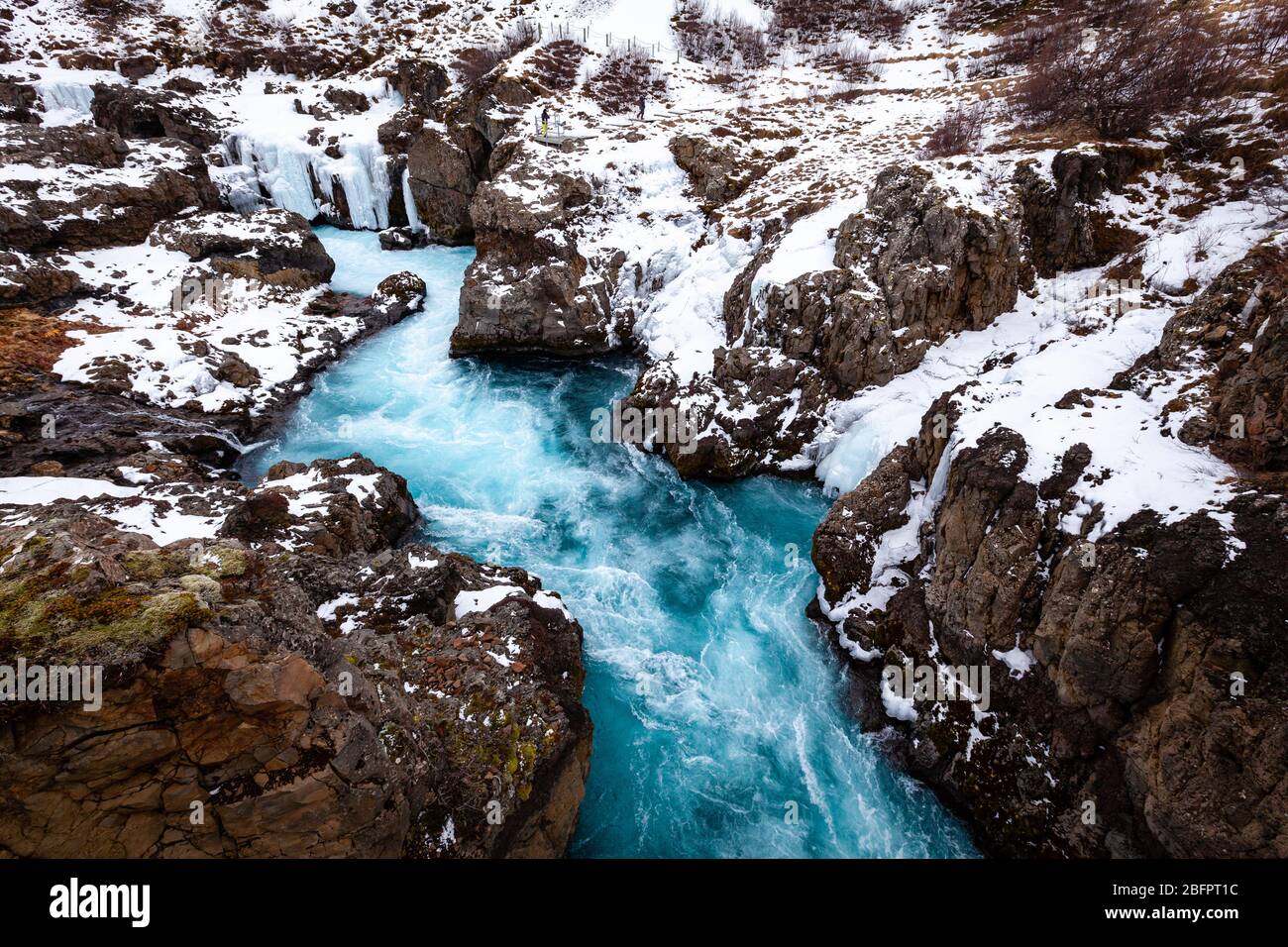 Barnafoss (Bjarnafoss) waterfall near Hraunfossar on the glacier-fed ...