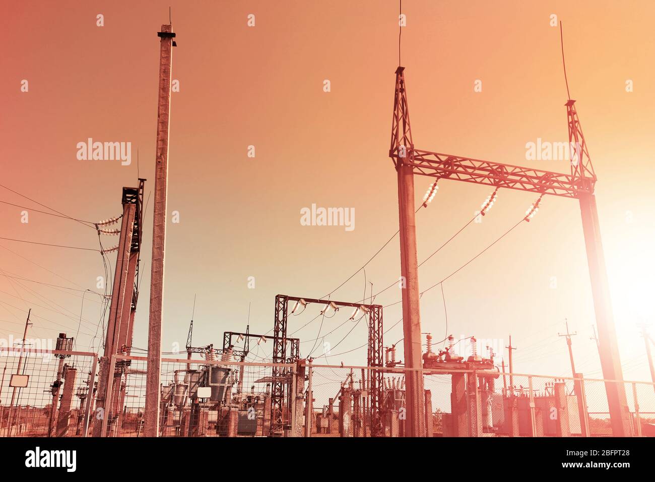 Electrical substation on sky background at sunset Stock Photo - Alamy