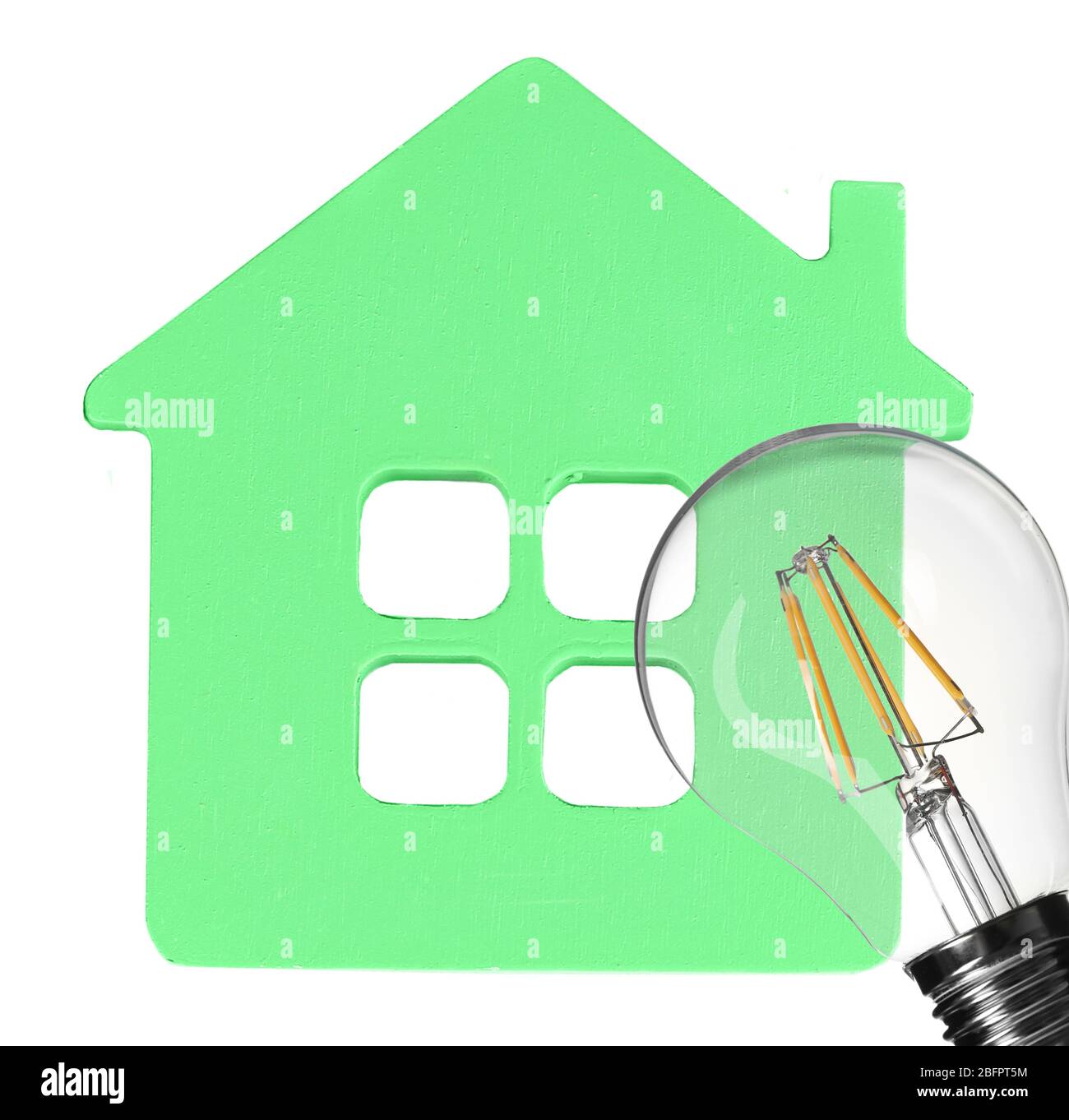 Model of house and light bulb on white background. Concept of energy ...