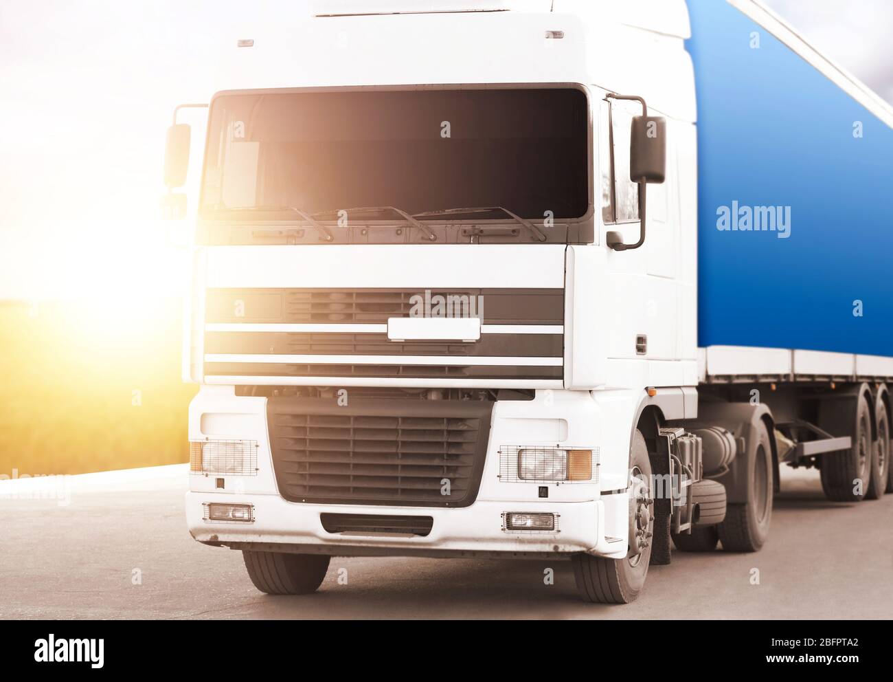 Modern truck on road. Wholesale and logistic concept Stock Photo - Alamy