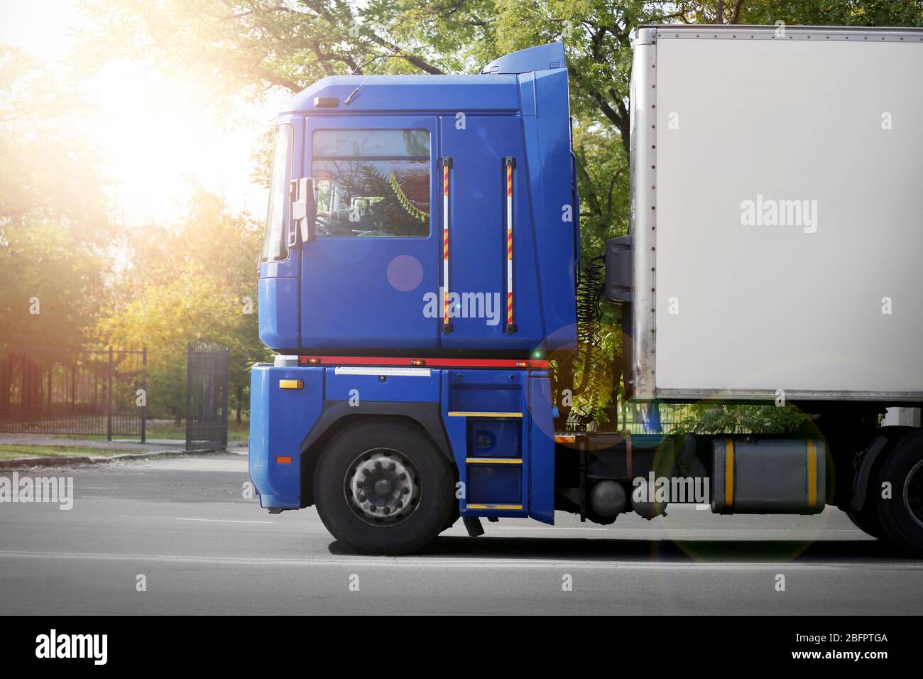 Modern truck on road. Wholesale and logistic concept Stock Photo - Alamy